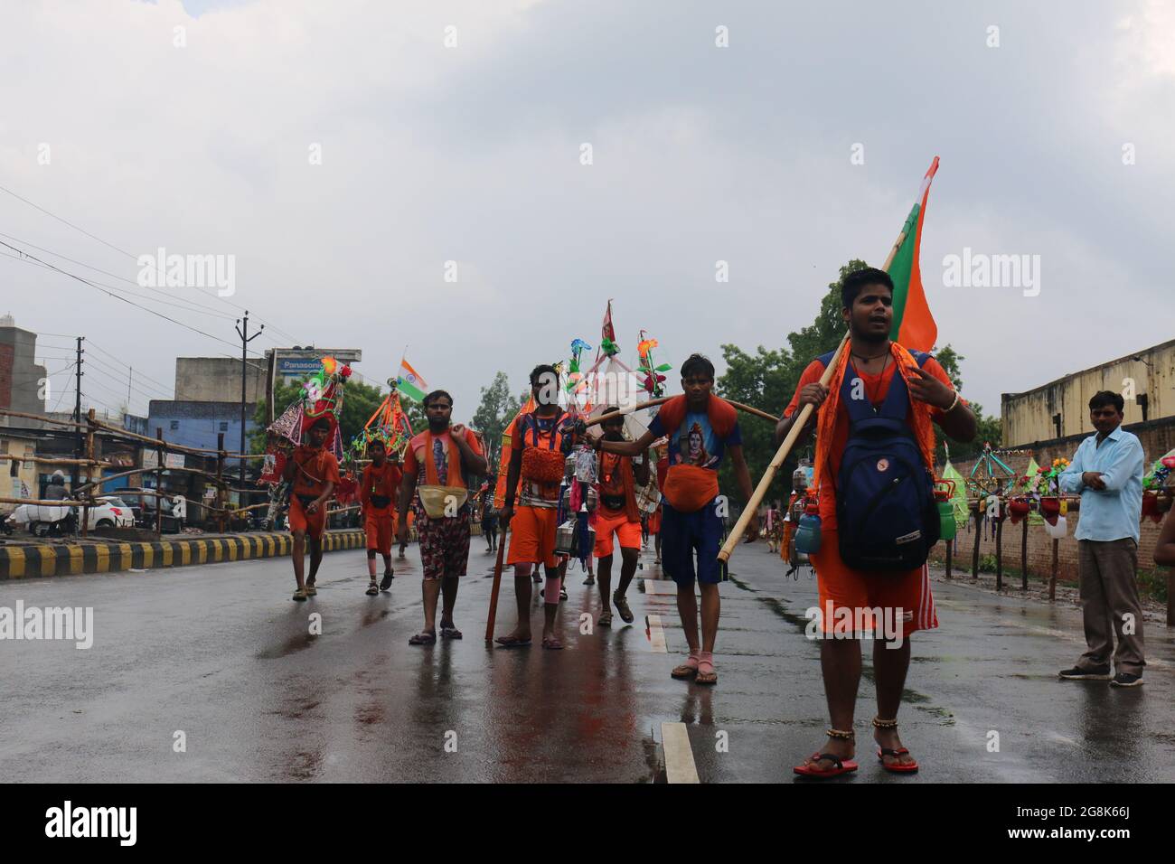 GHAZIABAD, INDIA - JULY 2019: A hindu devotee carrying kanwar on their ...