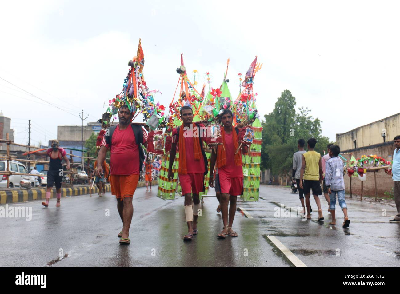 GHAZIABAD, INDIA - JULY 2019: A hindu devotee carrying kanwar on their ...