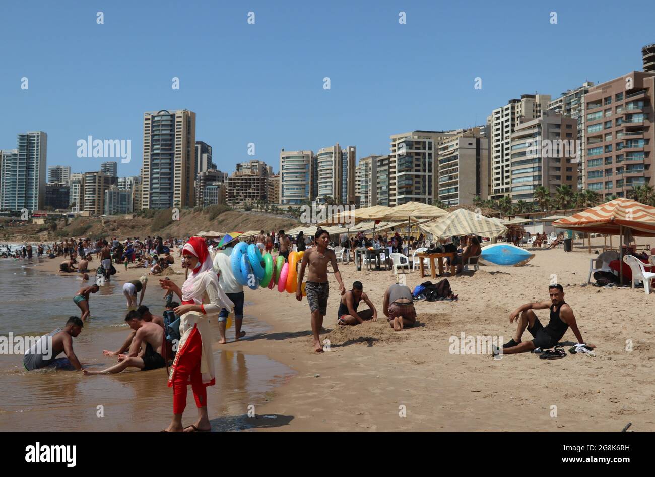 Beirut, Lebanon. 20th July, 2021. People on a beach near Rauchi Rock in ...
