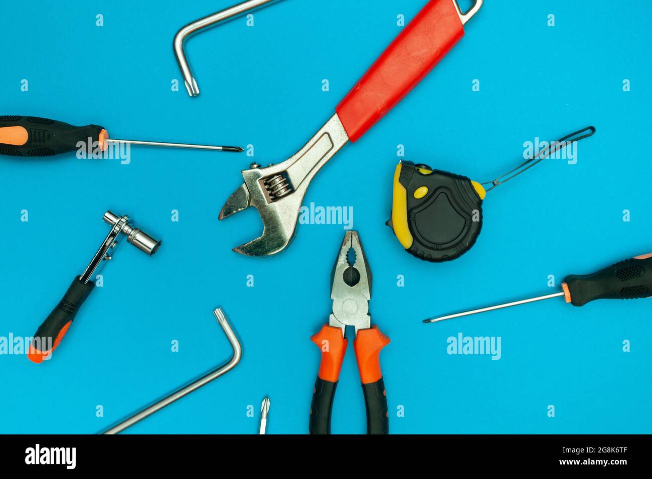 tools on isolated blue background Stock Photo - Alamy