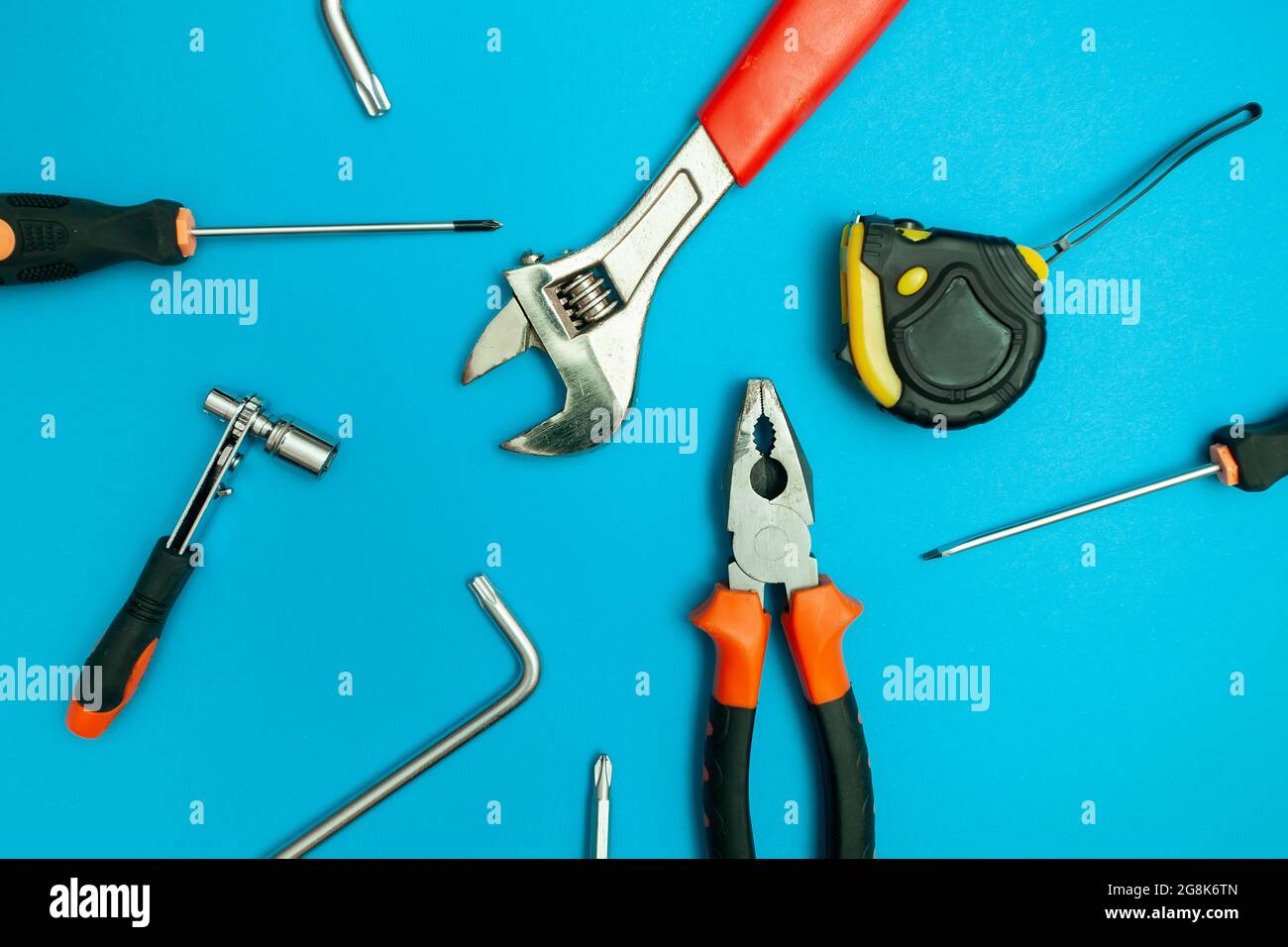tools on isolated blue background Stock Photo - Alamy