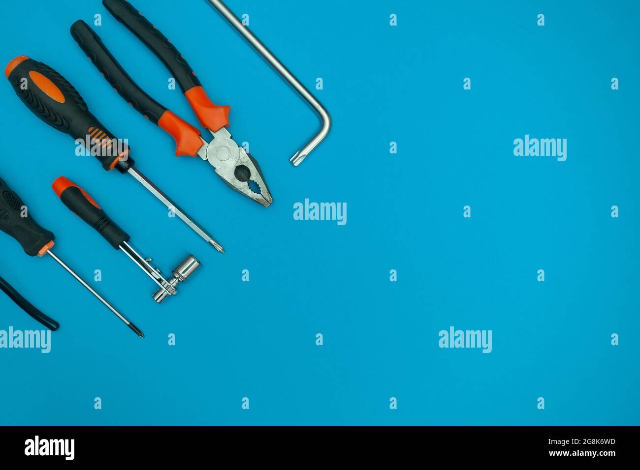 tools on isolated blue background Stock Photo - Alamy