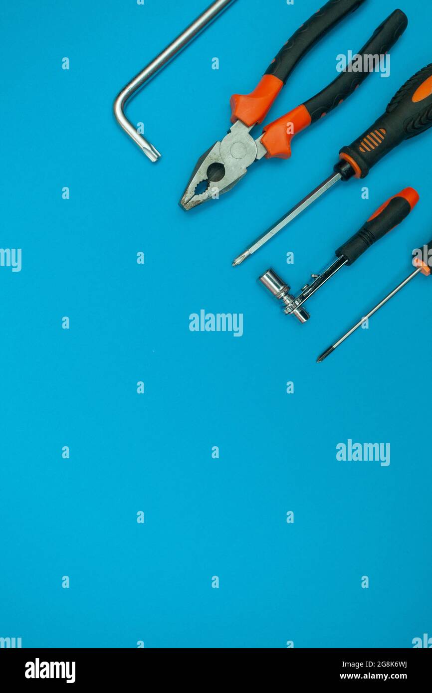 tools on isolated blue background Stock Photo - Alamy