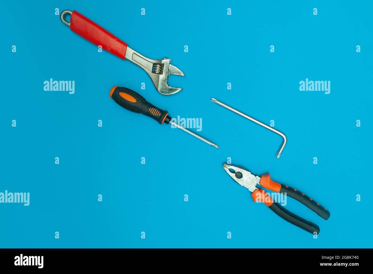 tools on isolated blue background Stock Photo - Alamy