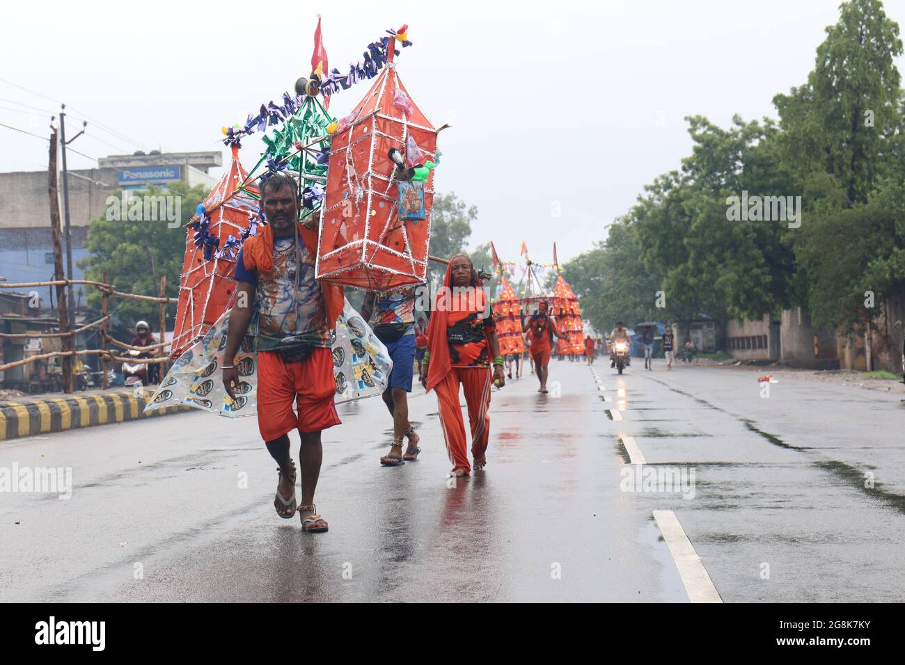 GHAZIABAD, INDIA - JULY 2019: A hindu devotee carrying kanwar on their ...