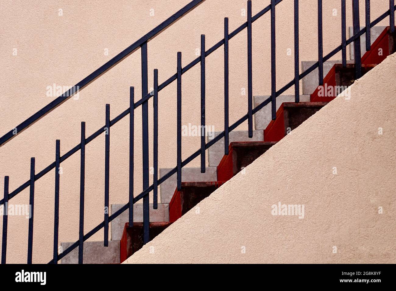 Stairway with metallic black painted handrails Stock Photo - Alamy