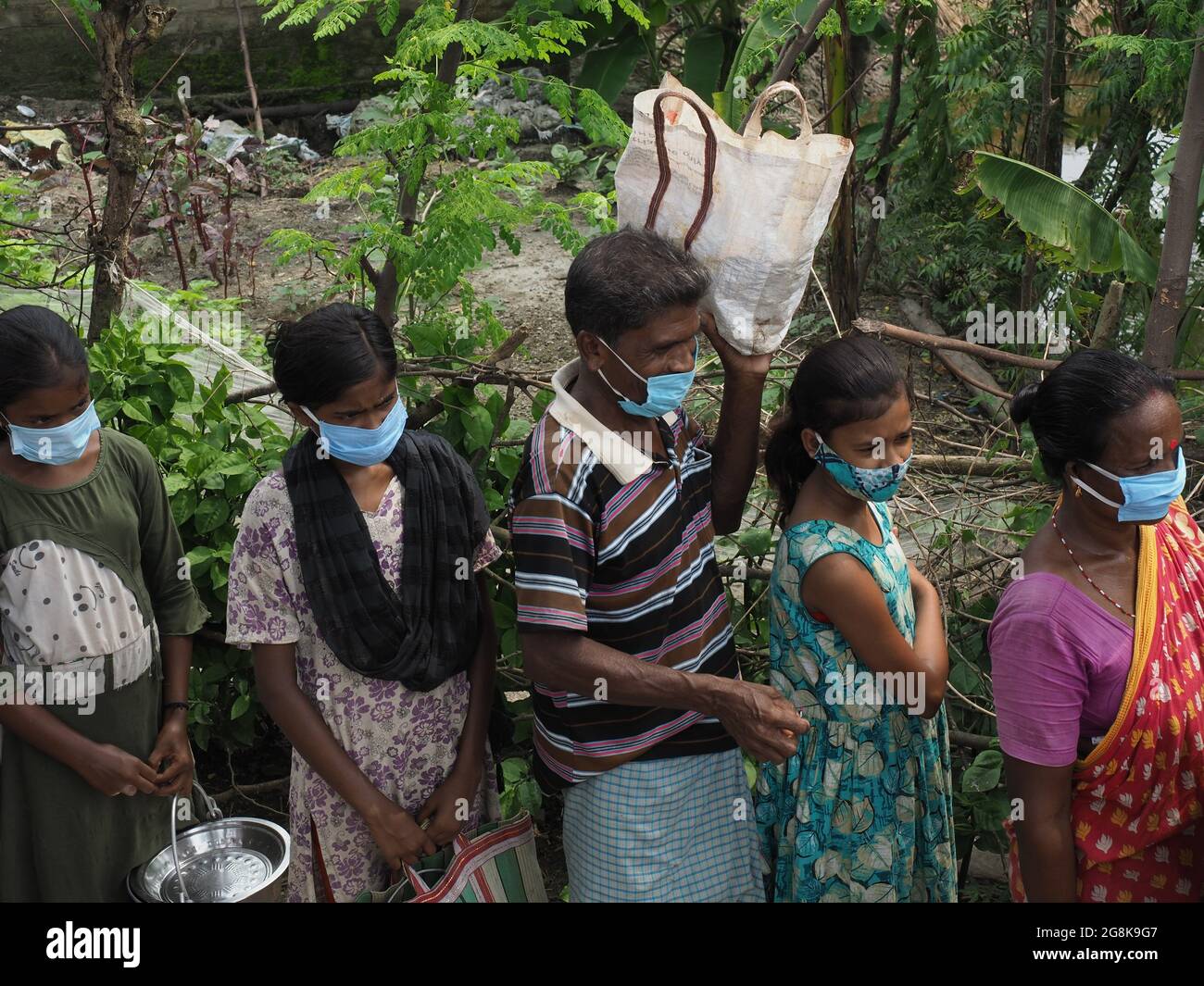 KOLKATA, INDIA - Jun 29, 2021: Flood affected people are living under ...