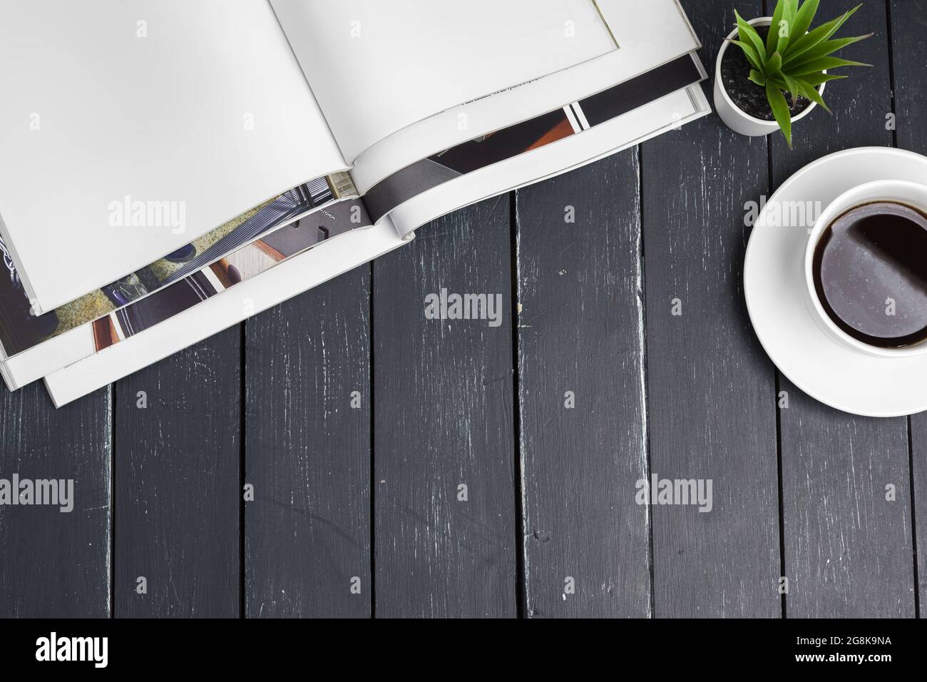 Close up stacking magazine place on table background Stock Photo - Alamy