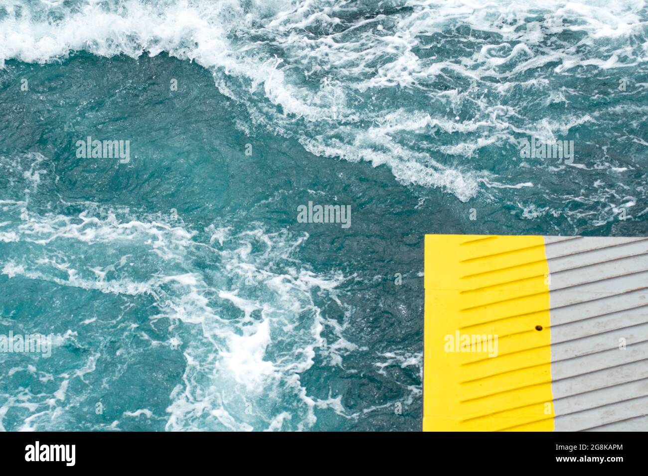 Greek ferry Ramp being lowered as boat sails into harbor High angle ...