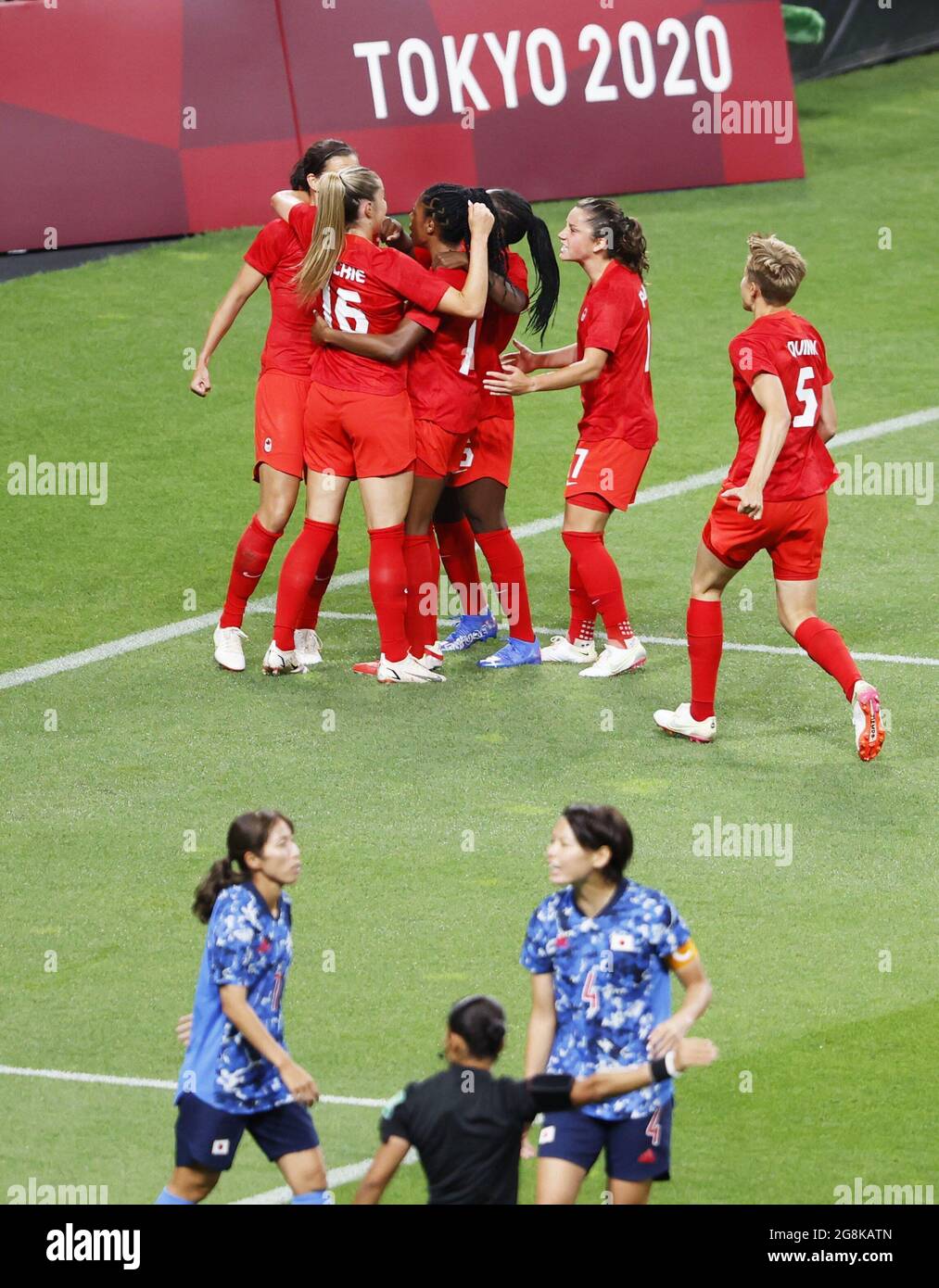 Tokyo, Japan. July 21 2021: The Canadian team (top) celebrates after ...