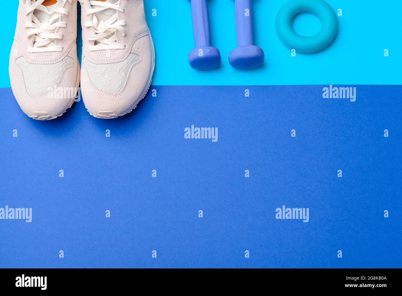 Fitness Gym equipment on color background Stock Photo - Alamy