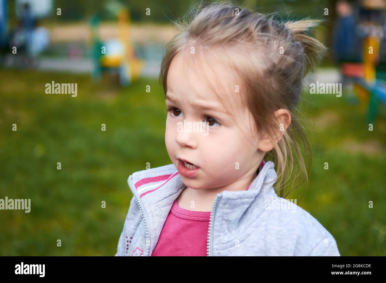 Little irritated child girl showing frustration and disagreement Stock ...