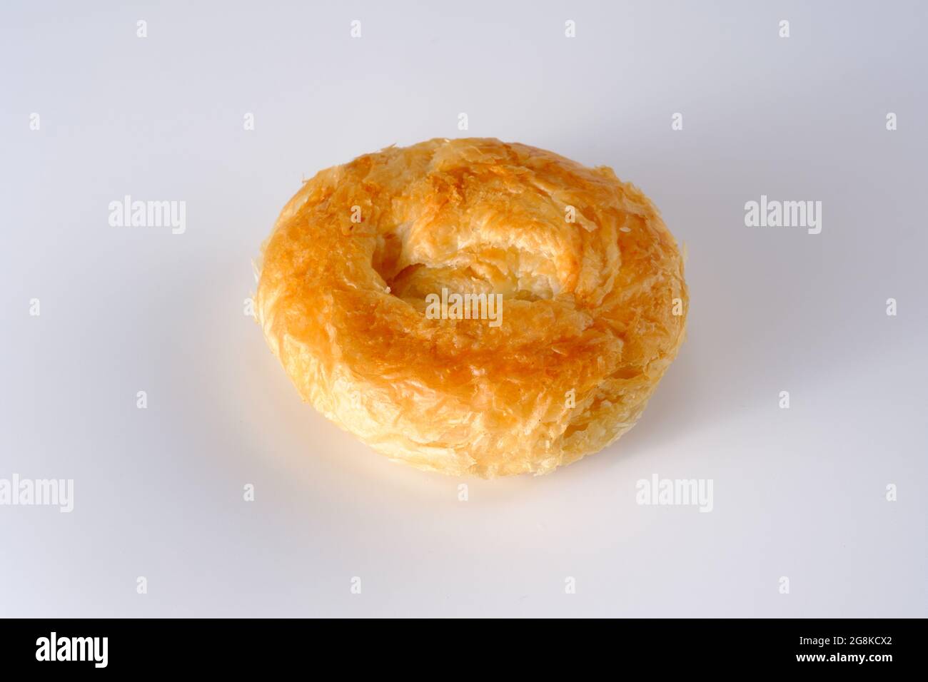 Close up shot of a Turkish pastry boyoz on a white background Stock ...