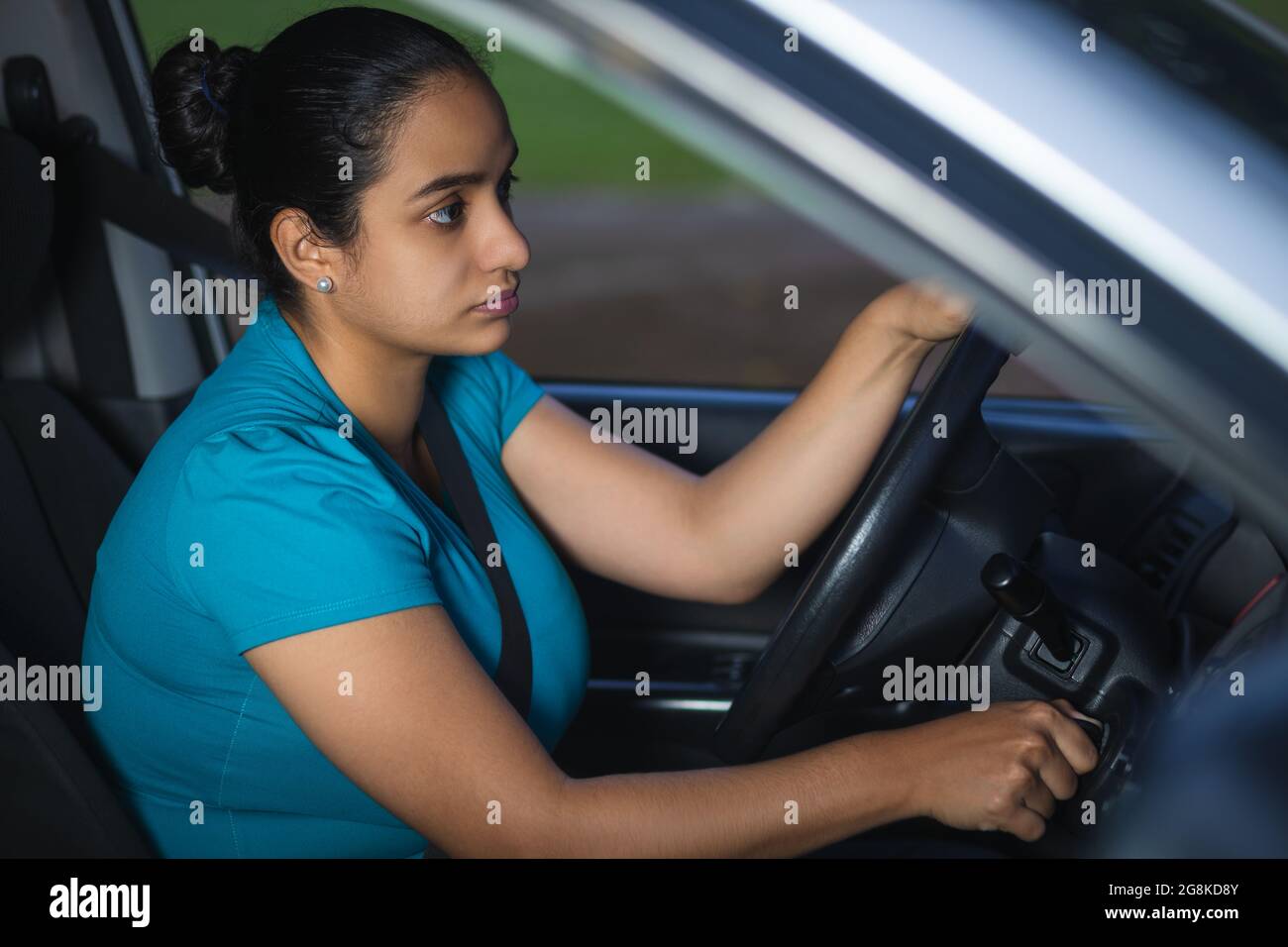 Closeup woman starting car hi-res stock photography and images - Alamy