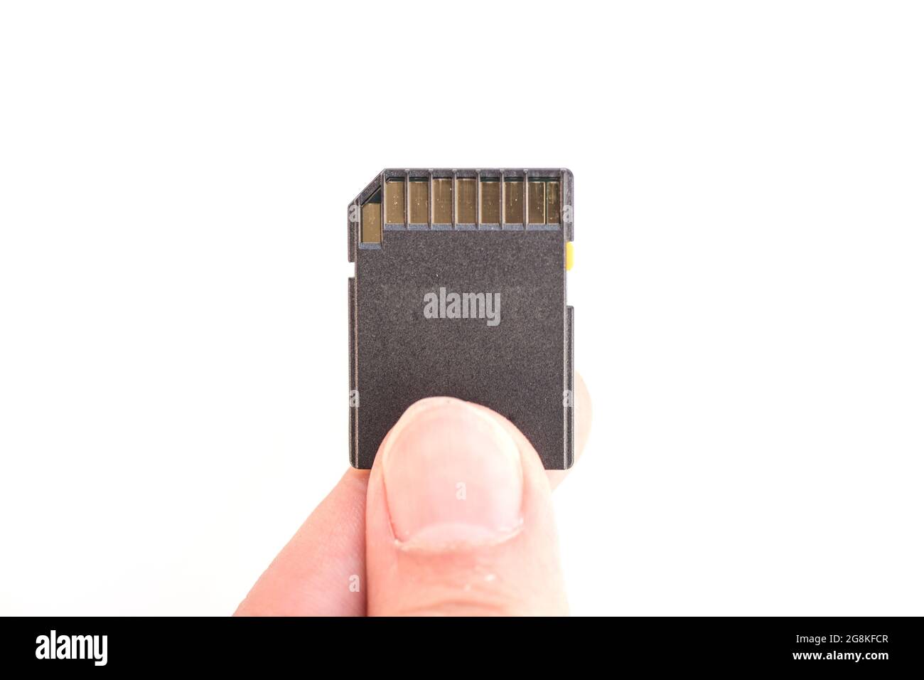 male hand holding sd memory card. Isolated on white background Stock ...