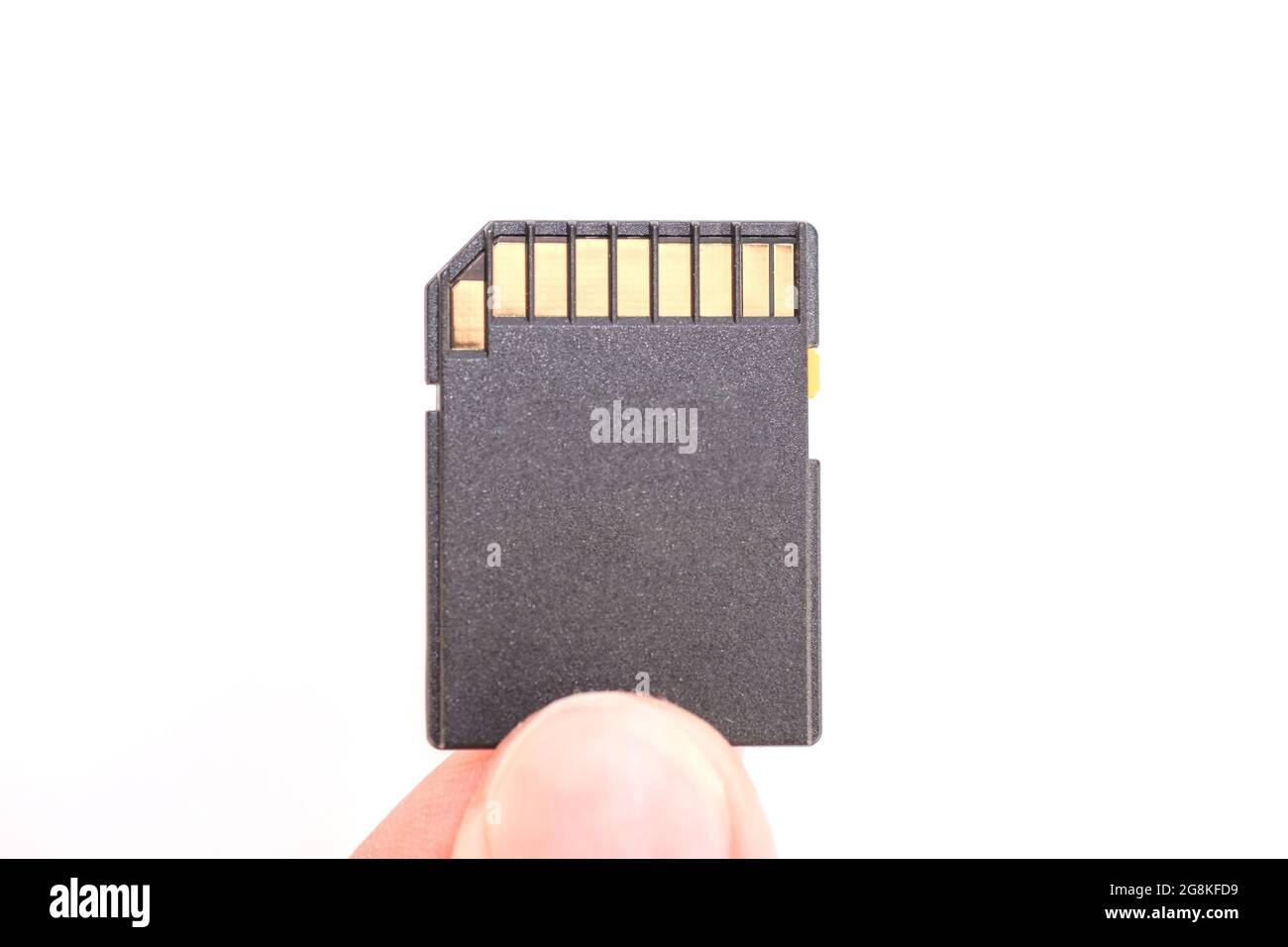 male hand holding sd memory card. Isolated on white background Stock ...