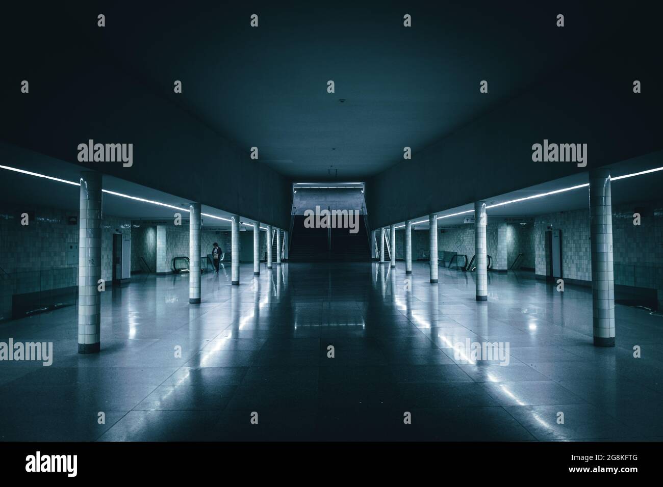 Long scary dark corridor with columns Stock Photo - Alamy
