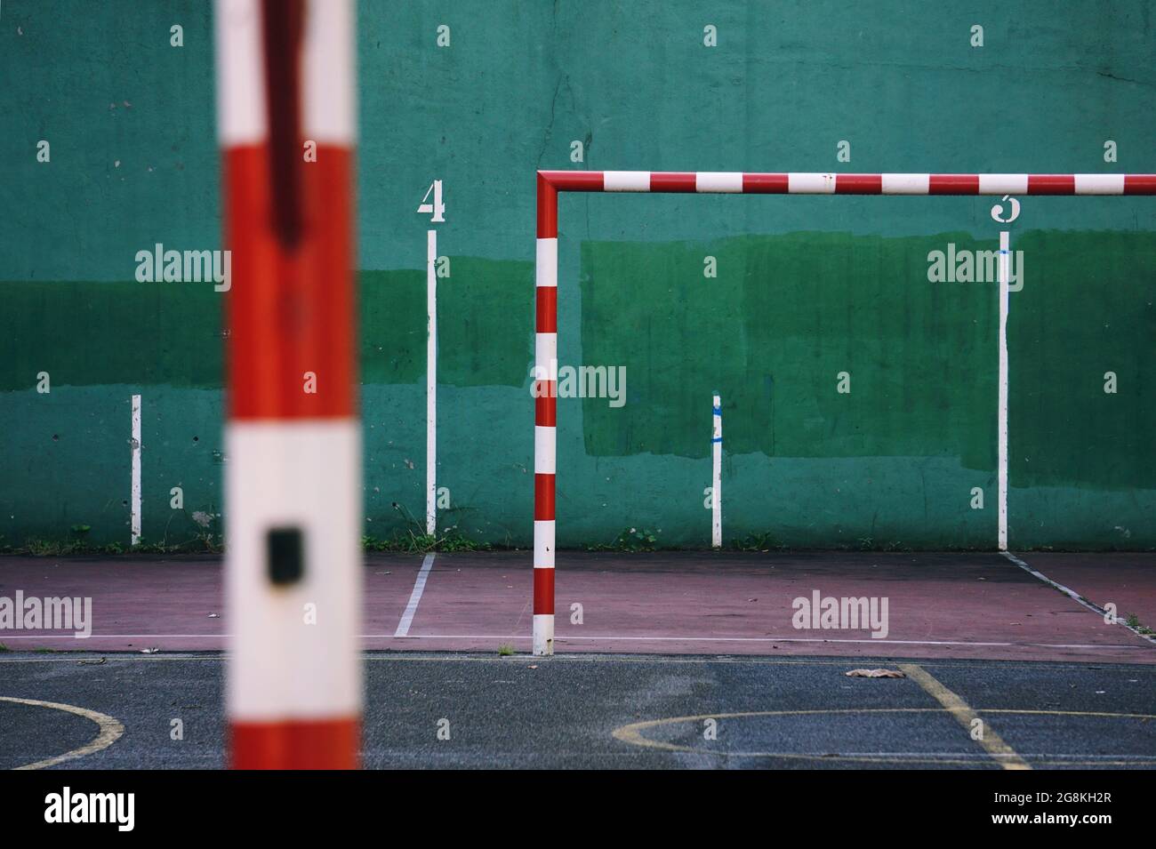 Metallic white and red painted goal post on the football field Stock ...