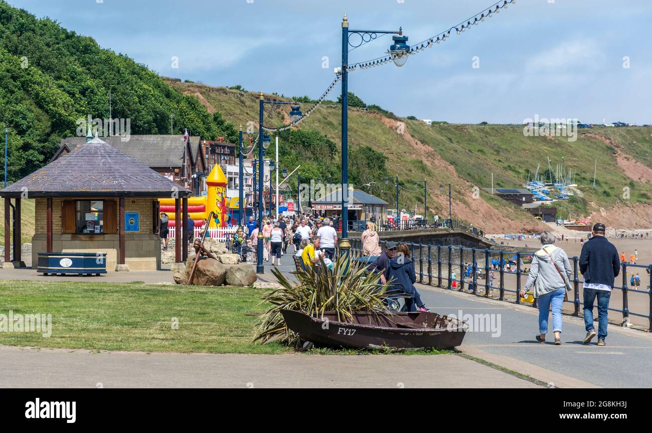 People enjoy the sun, out on the promenade at Filey, a North Yorkshire ...