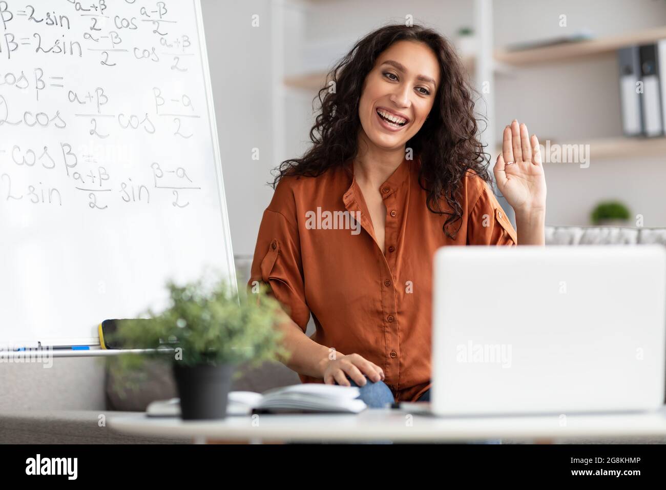 Waving hello hi-res stock photography and images - Alamy