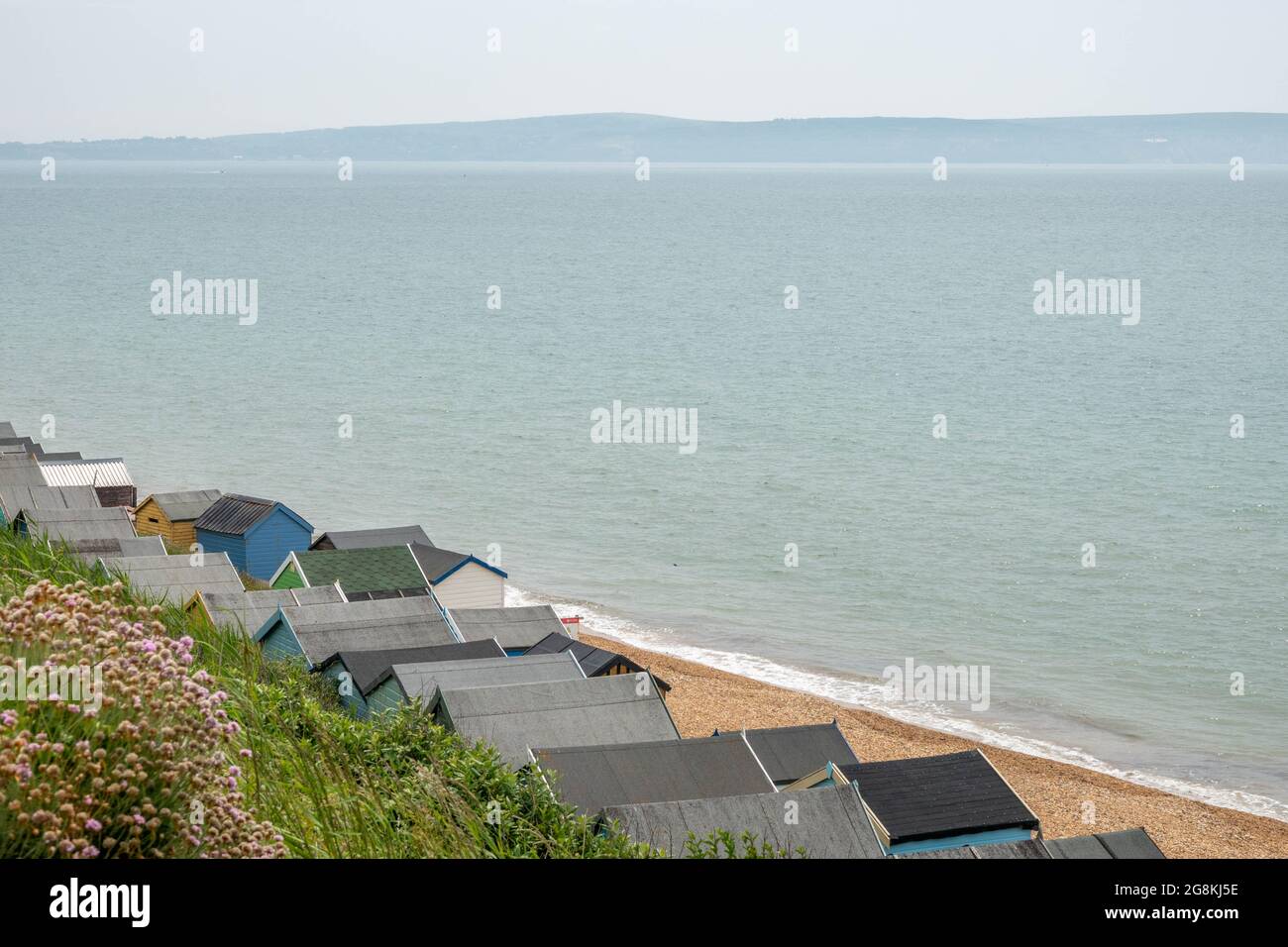 Empty beach and beach huts hi-res stock photography and images - Alamy
