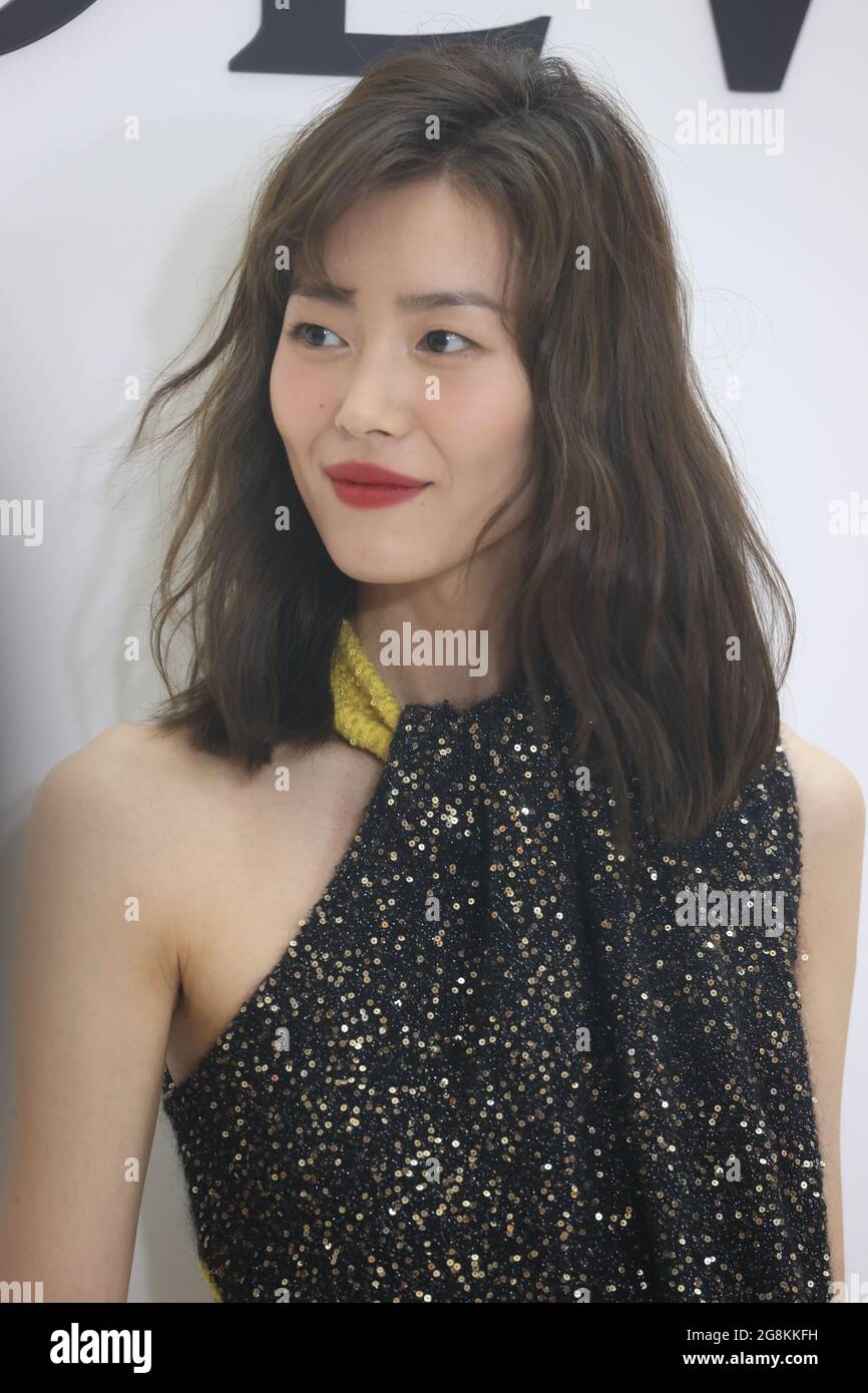 Chinese model Liu Wen wears hanging sequins dress attending Loewe ...