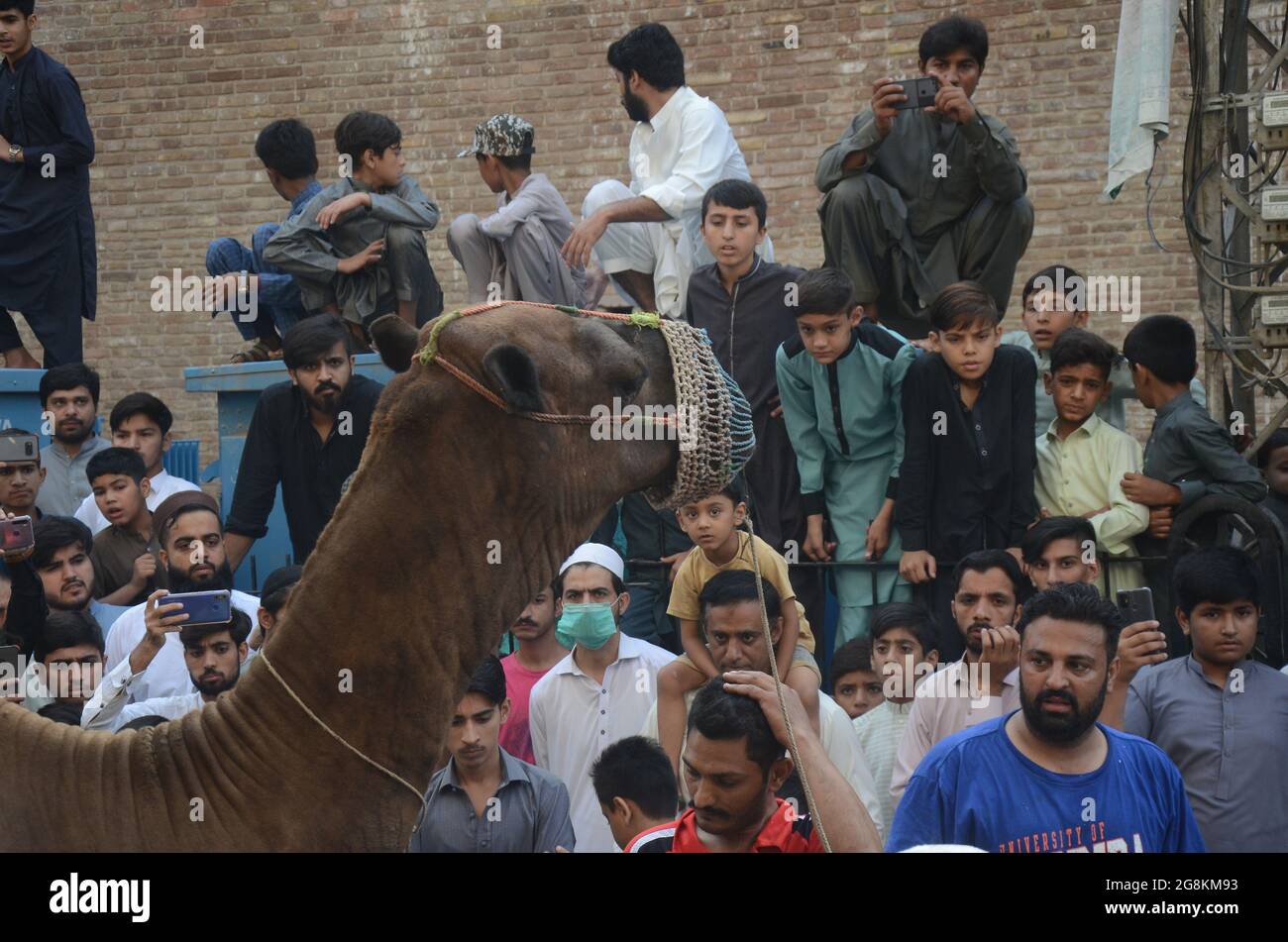 Peshawar, Pakistan. 21st July, 2021. Pakistani Muslims offer Eid al ...