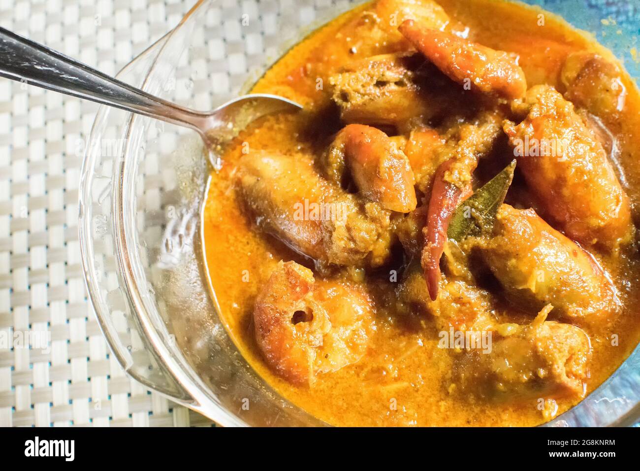Orange coloured Prawns, cooked and served in a bowl, Indian delicacy ...