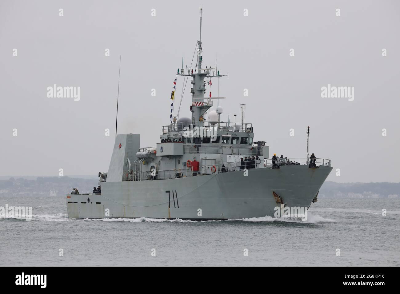 The Royal Canadian Navy minesweeper HMCS SUMMERSIDE (MM711) approaching ...