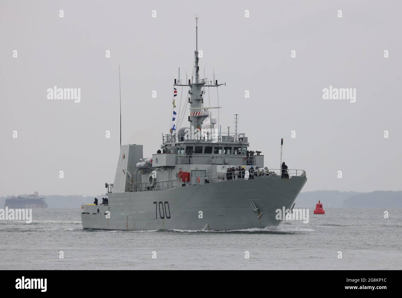 The Royal Canadian Navy minesweeper HMCS KINGSTON (MM700) approaching ...
