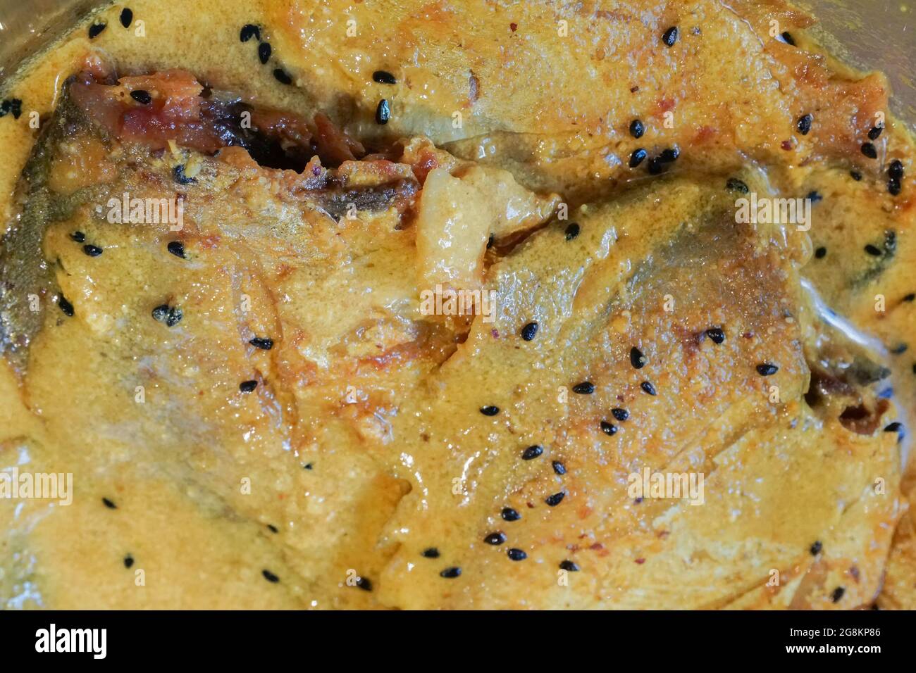 Pomfret fish pieces on plate, spicy Indian dish. Popular amongst ...