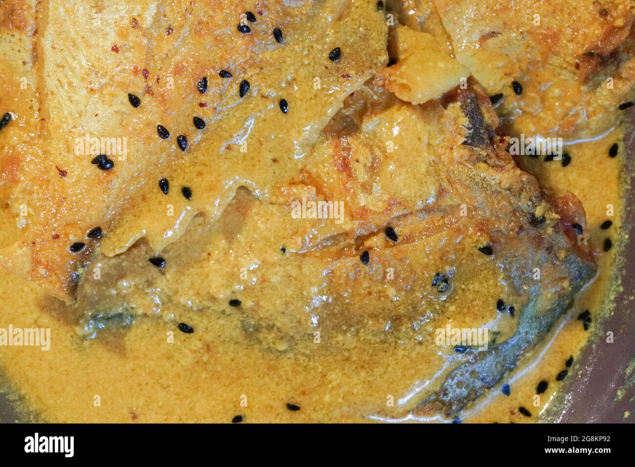 Pomfret fish pieces on plate, spicy Indian dish. Popular amongst ...