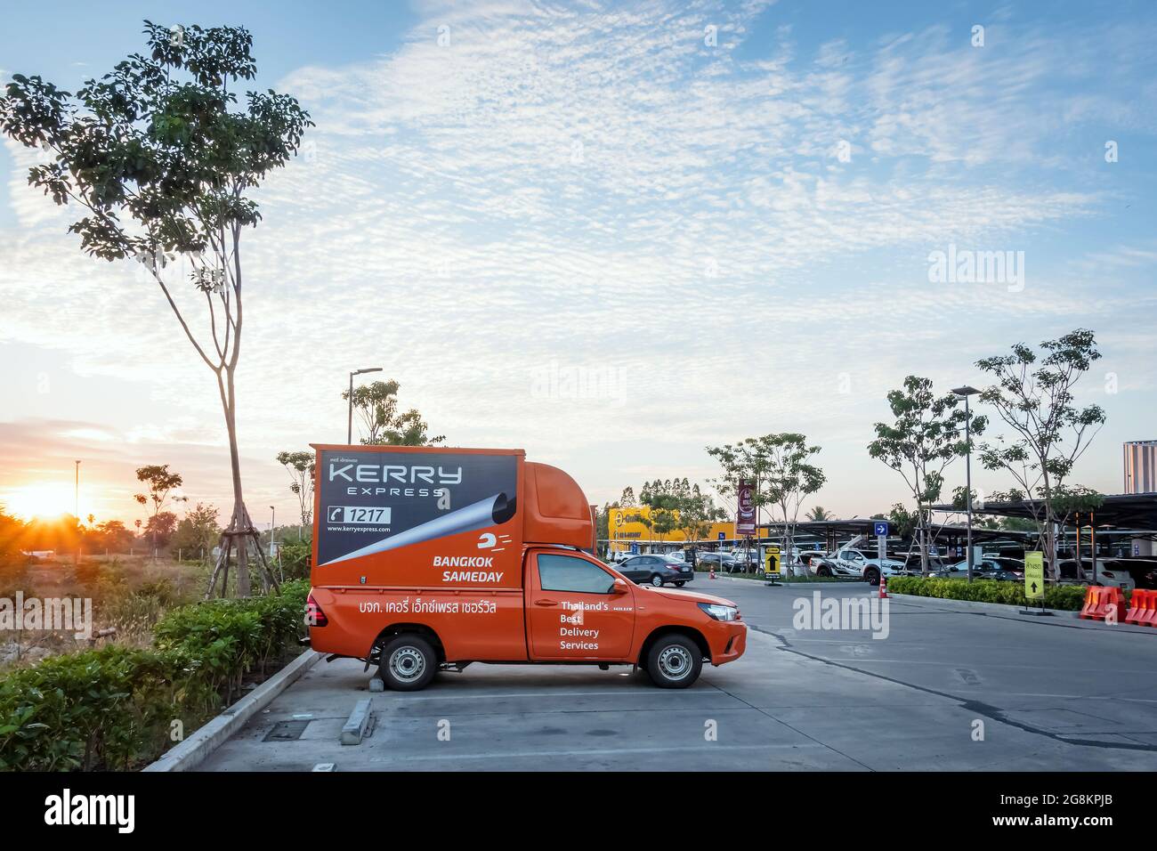 KANCHANABURI,THAILAND-DECEMBER 24,2020 : Kerry express cars parked to ...