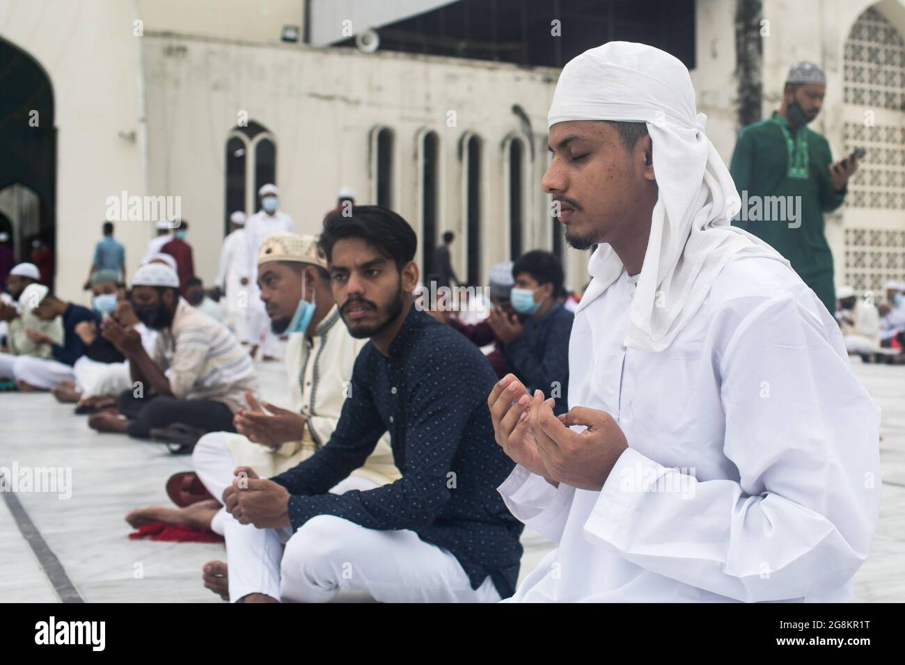 Muslims offer prayers to mark the start of the Muslim festival Eid al ...