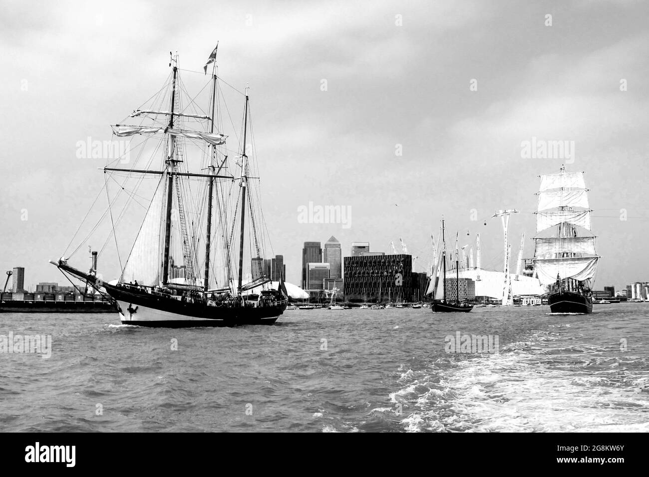 Sailing ships, in black and white, on the river Tames, sailing out ...