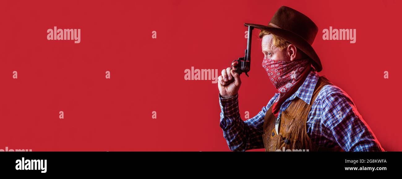 Portrait of a cowboy. American bandit in mask, western man with hat ...