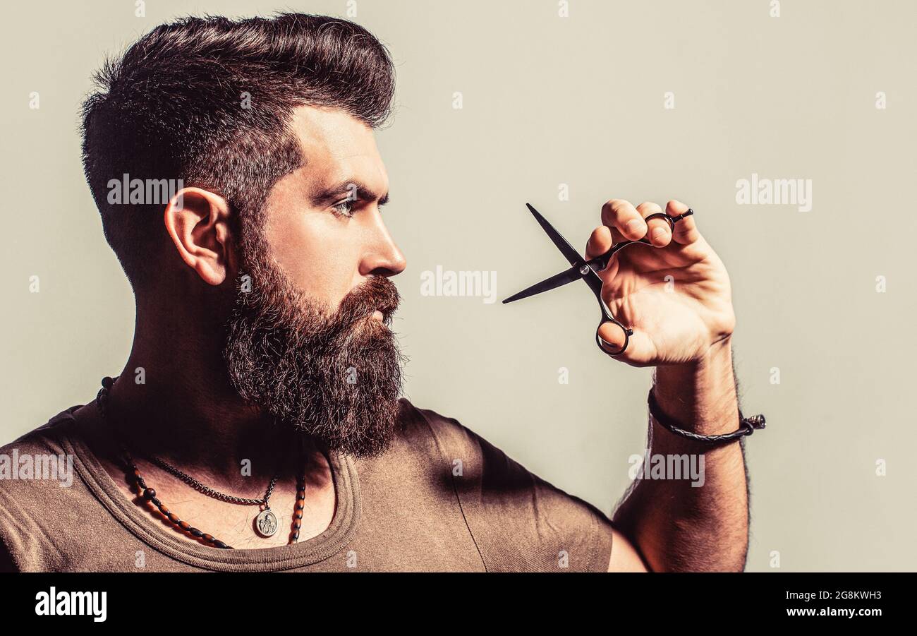 Mans haircut in barber shop. Barber scissors, barber shop. Barber ... Mans haircut in barber shop. Barber scissors, barber shop. Barber ...