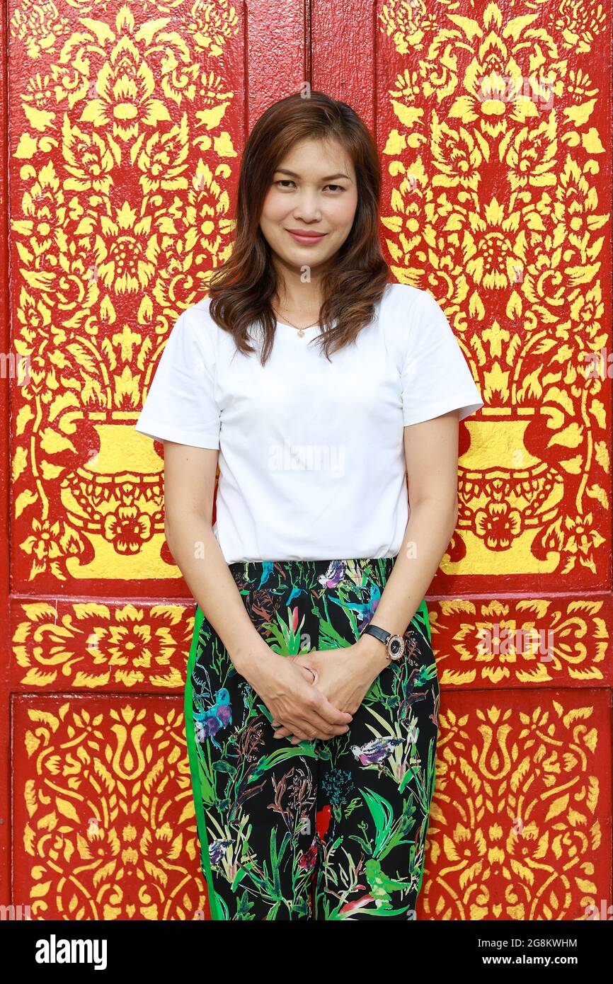 Asian woman in southern native Thai style pattern paint pants in with ...