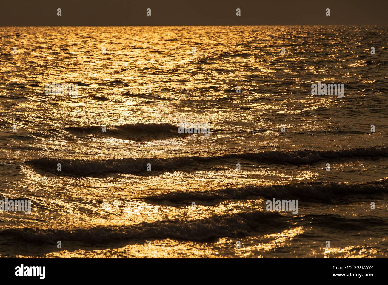 Texture of tropical sea water and wave in golden light of sunset Stock ...