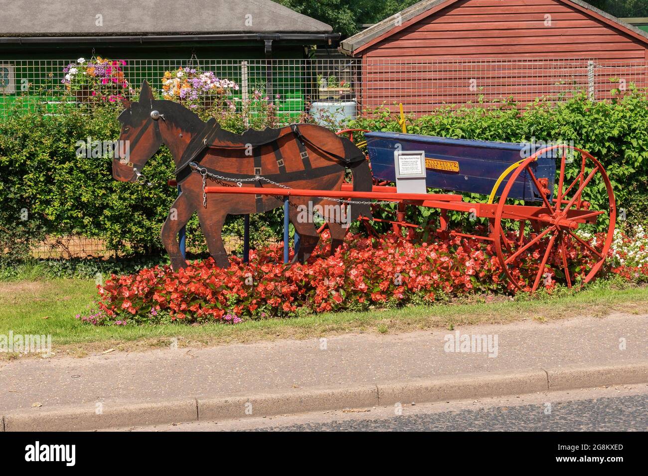Filby village in bloom horse and cart Stock Photo - Alamy