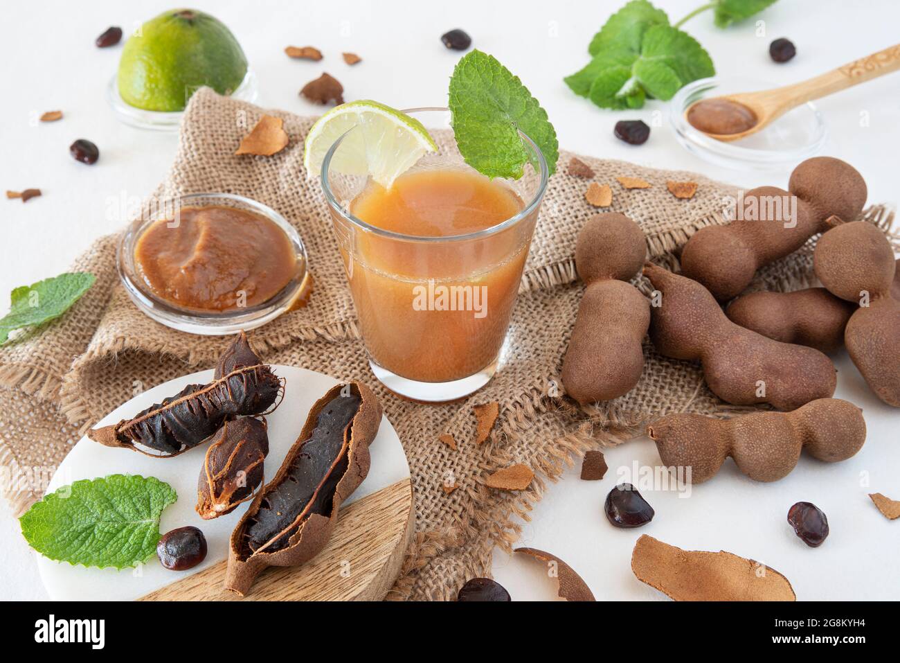 preparation of juice and pulp from tamarind fruit Stock Photo - Alamy