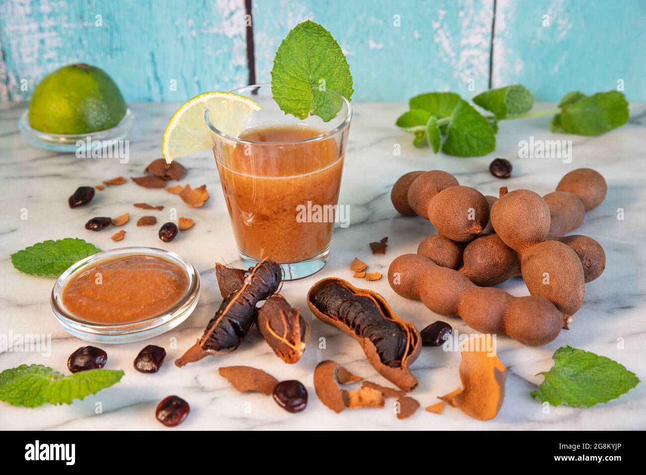 preparation of juice and pulp from tamarind fruit Stock Photo - Alamy