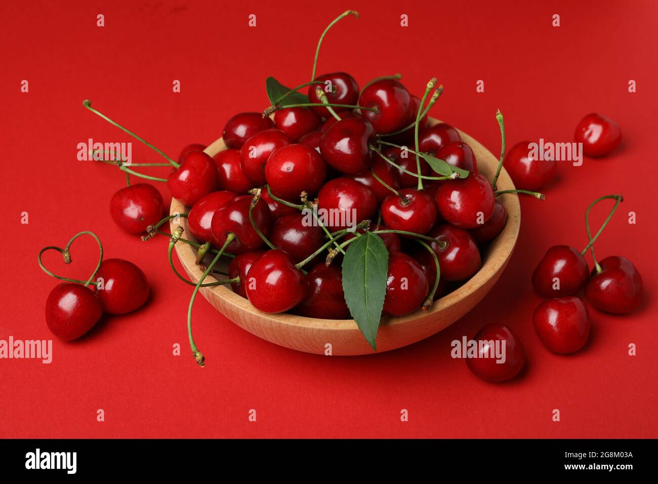 Concept of sweet berry with red cherry Stock Photo - Alamy