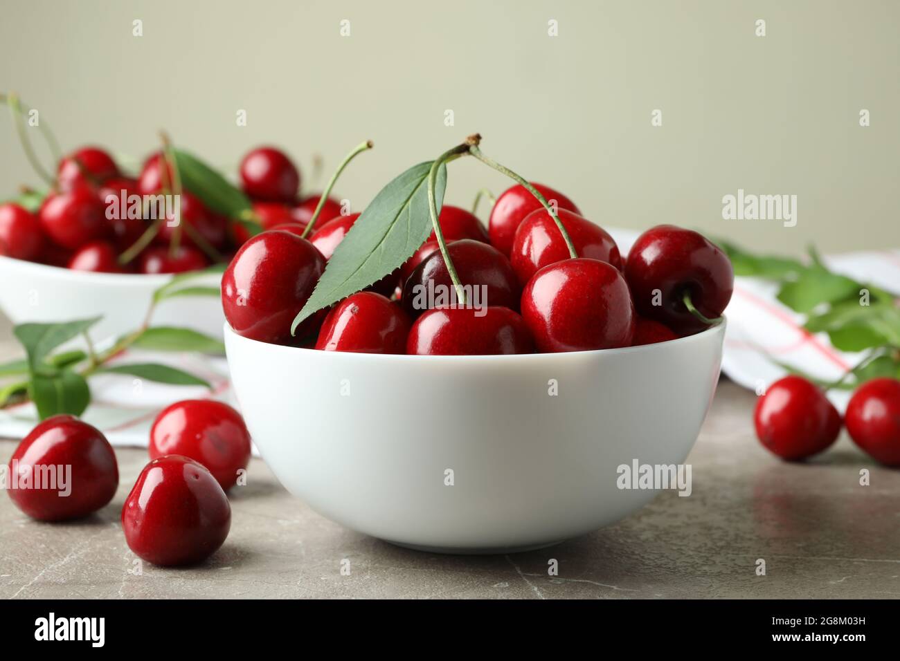 Concept of sweet berry with red cherry Stock Photo - Alamy
