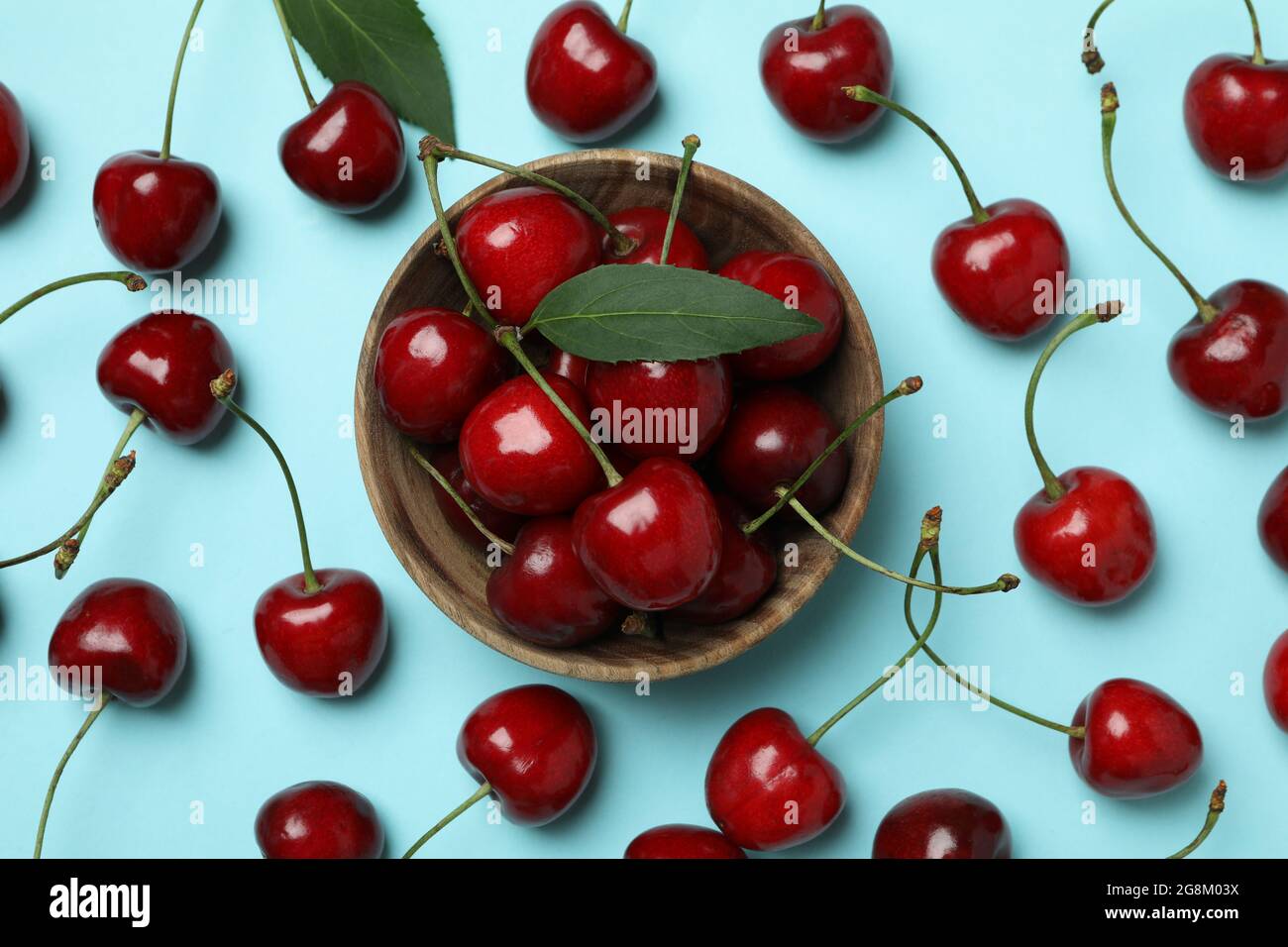Concept of sweet berry with red cherry Stock Photo - Alamy