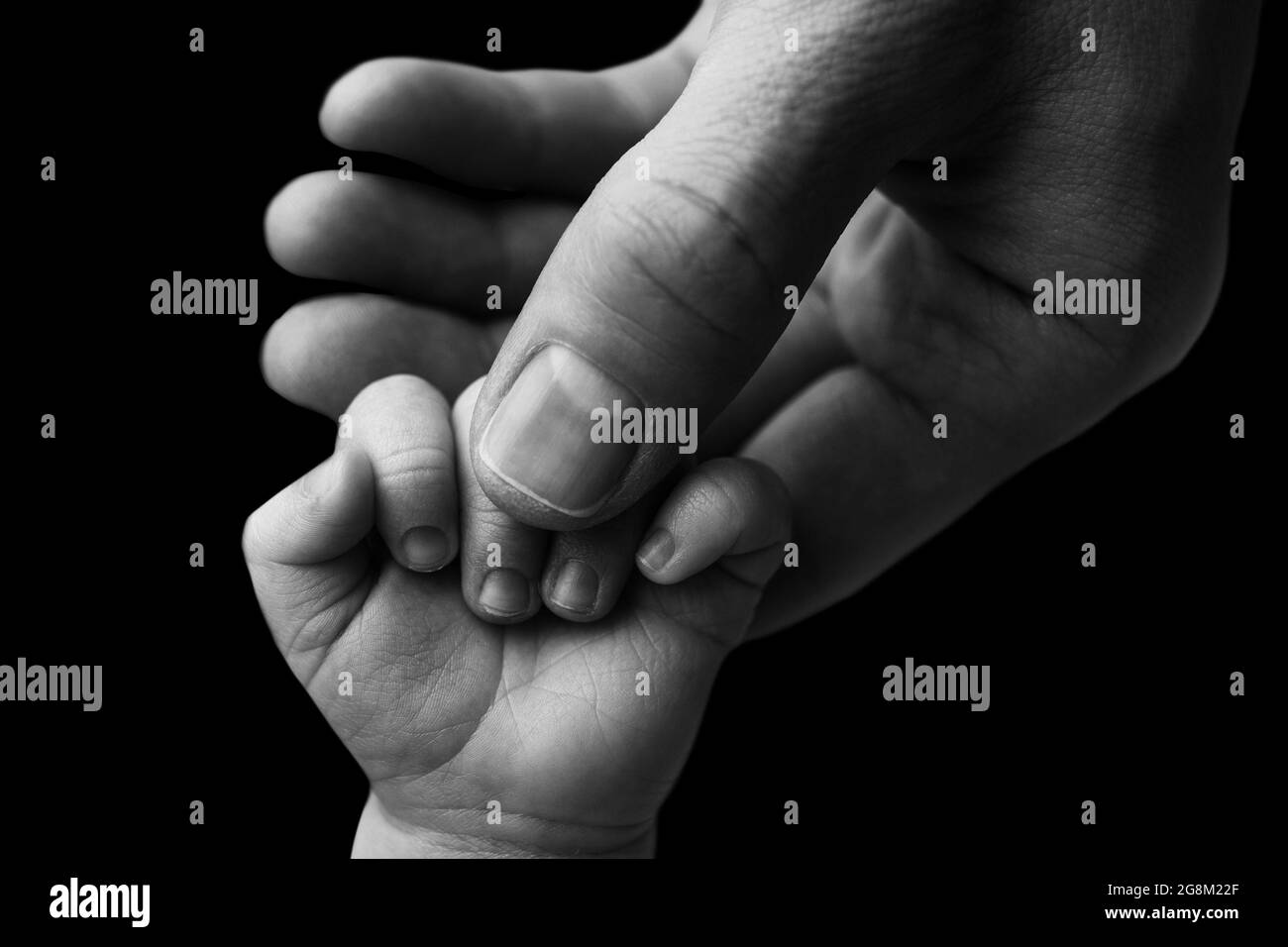 Baby in fathers hand hi-res stock photography and images - Alamy