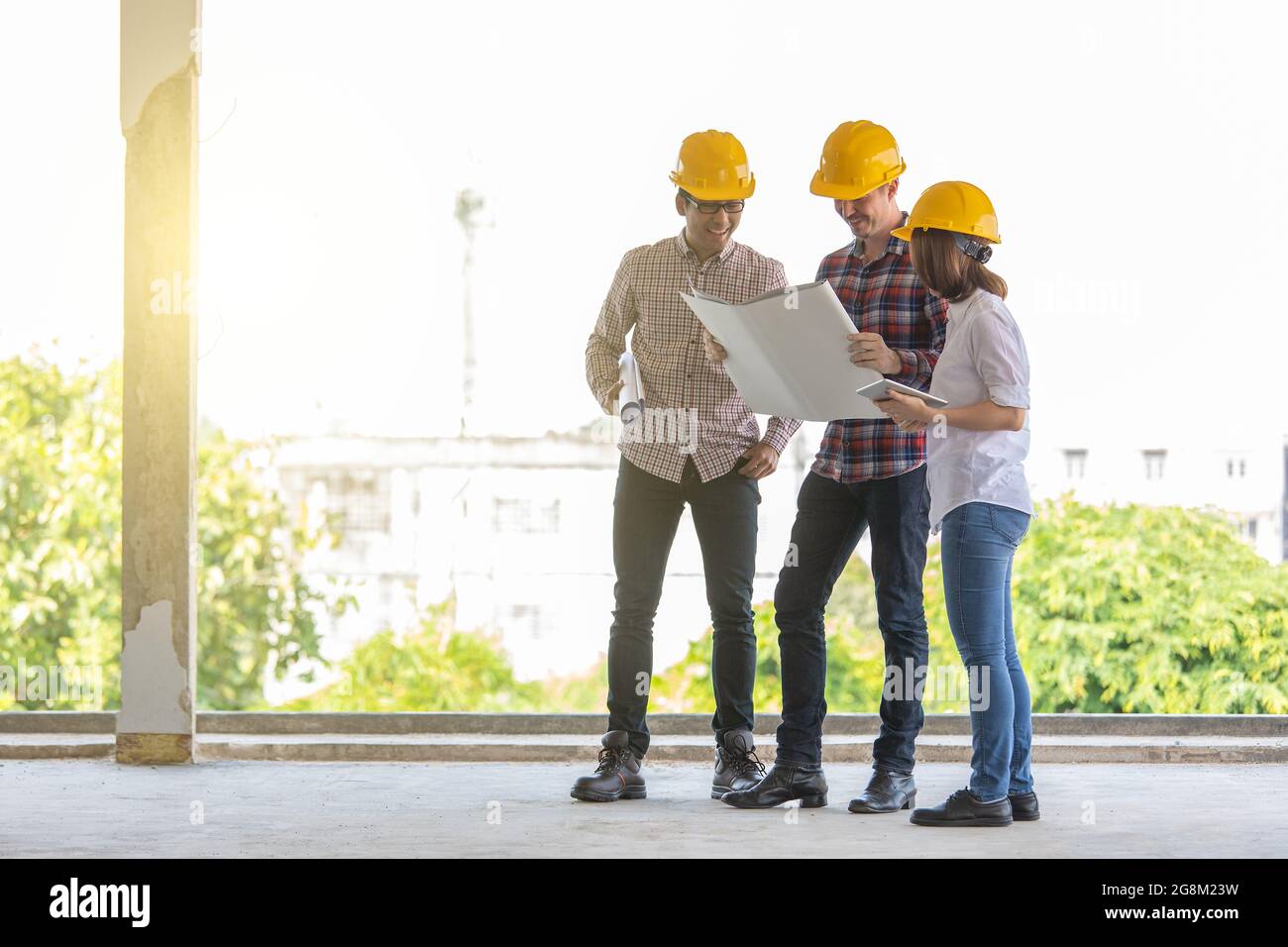 Diverse group of engineers, Asian and caucasian, man and woman working ...