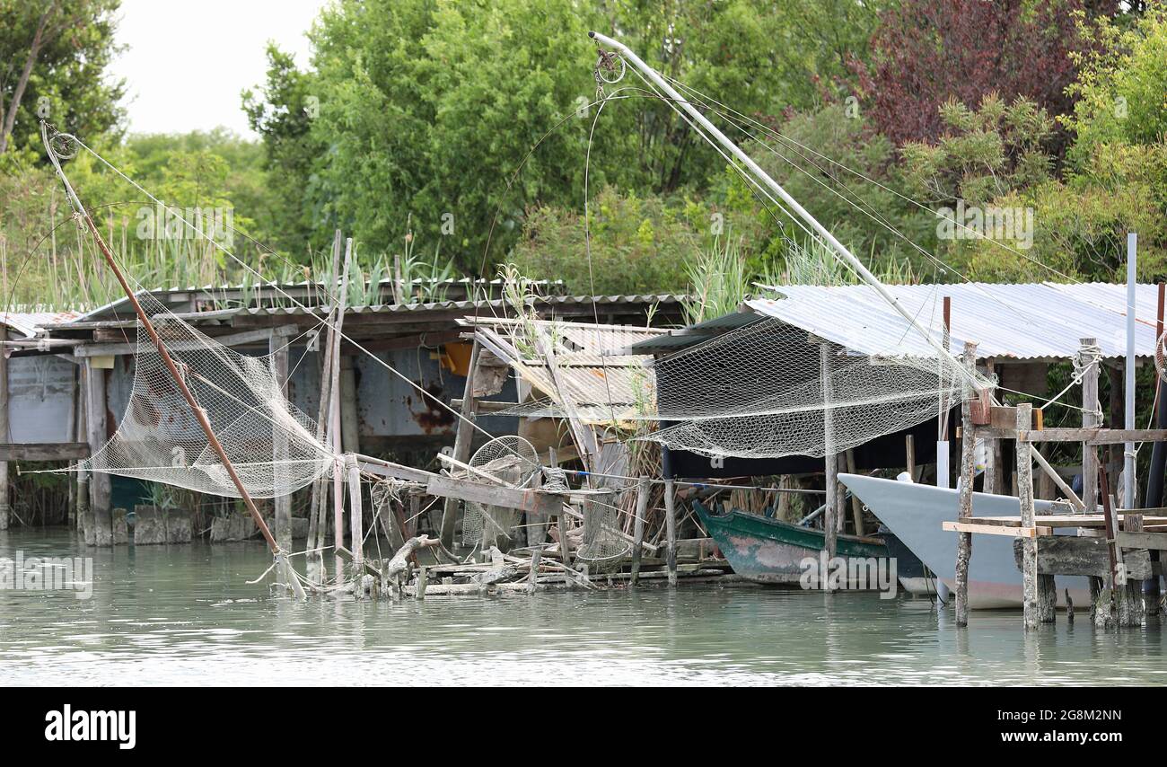 special nets to fishing and boats of the fishermen on the water of the ...