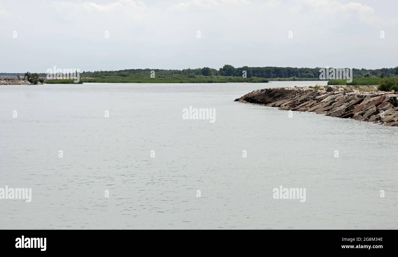 wide mouth of the river called Adige in northern Italy which flows into ...