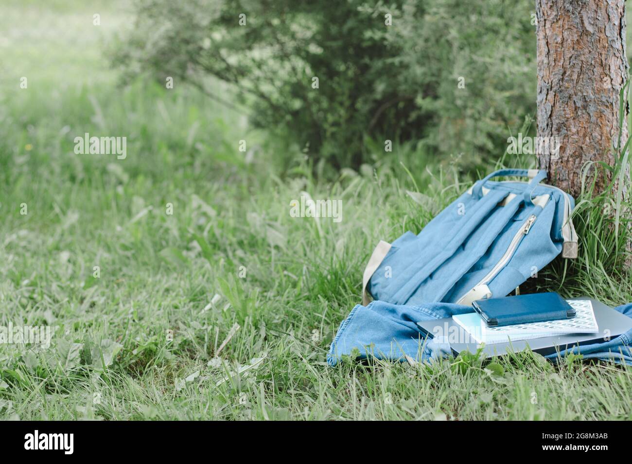 Backpack blue wood hi-res stock photography and images - Alamy